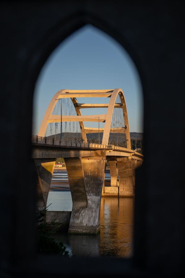 Vertical Shot of a Bridge Seen through an Arch Stock Image - Image of ...