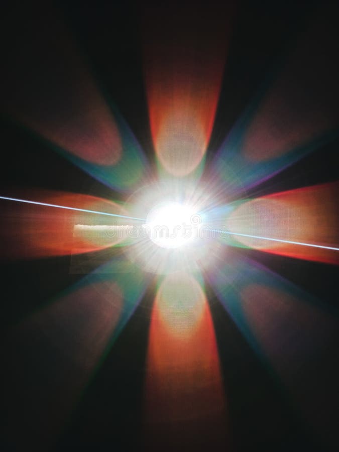 Vertical Shot of Bright Light Shining in Darkness with Blue and Red ...