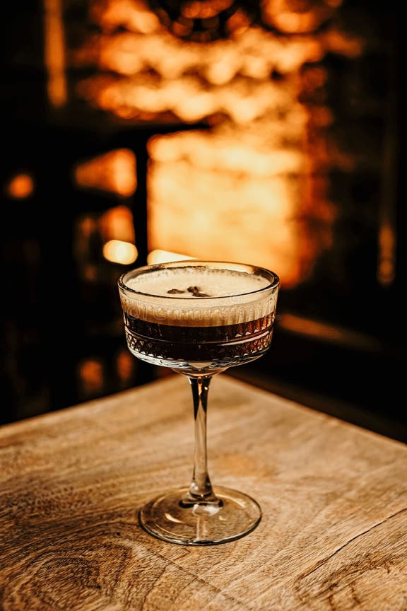 Vertical Shot of a Brown Fancy Cocktail Stock Photo - Image of beverage ...