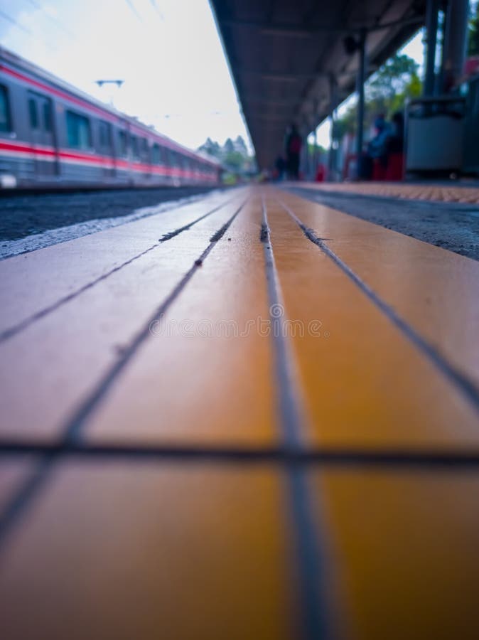 Vertical Shot of a Brown Tiled Floor in a Train Station Stock Image ...