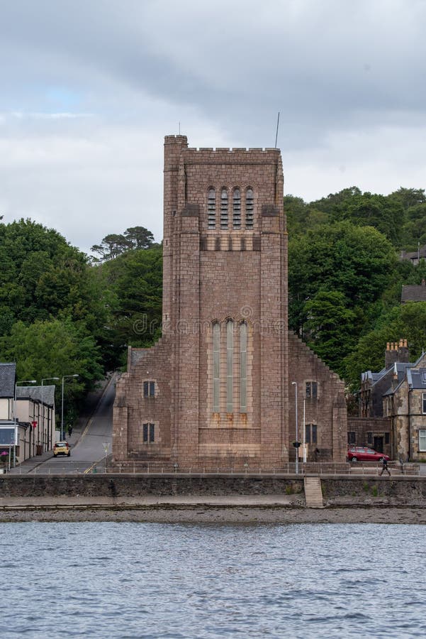 Vertical Shot of a Building on the Shore Stock Photo - Image of tourism ...
