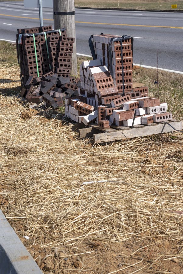 Bundle of Brick at New Construction Site Vertical Stock Photo - Image ...