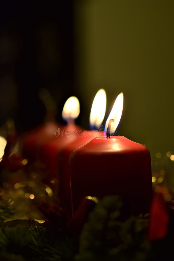 Vertical Shot of a Burning Candle at Chr Stock Image - Image of ...