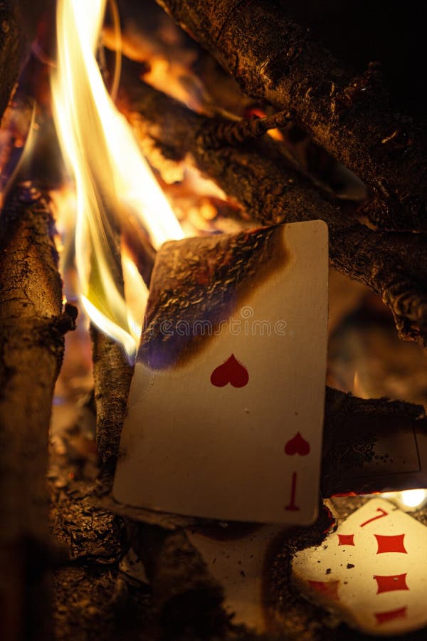 Vertical Shot of Burning Cards Stock Photo - Image of orange, burning ...