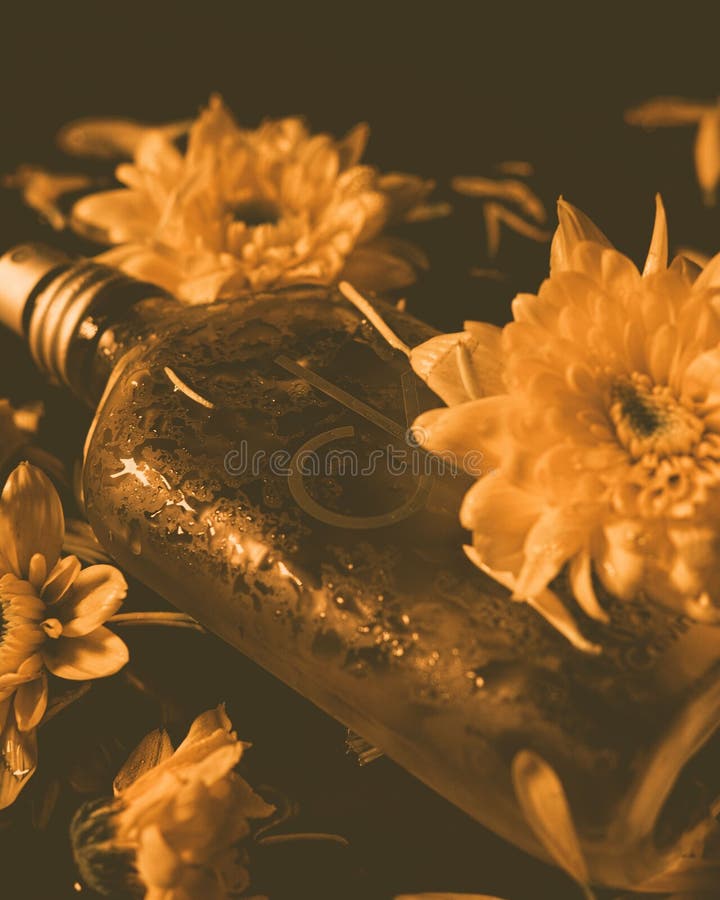 Vertical Shot of the Calvin Klein One Perfume with Flower Decorations ...