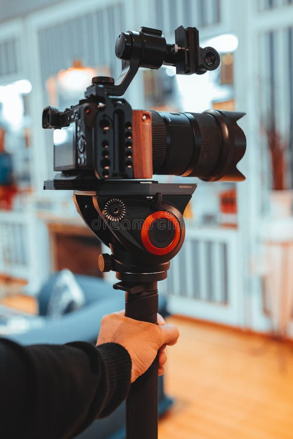 Vertical Shot of a Camera on a Tripod in the Room Stock Image - Image ...