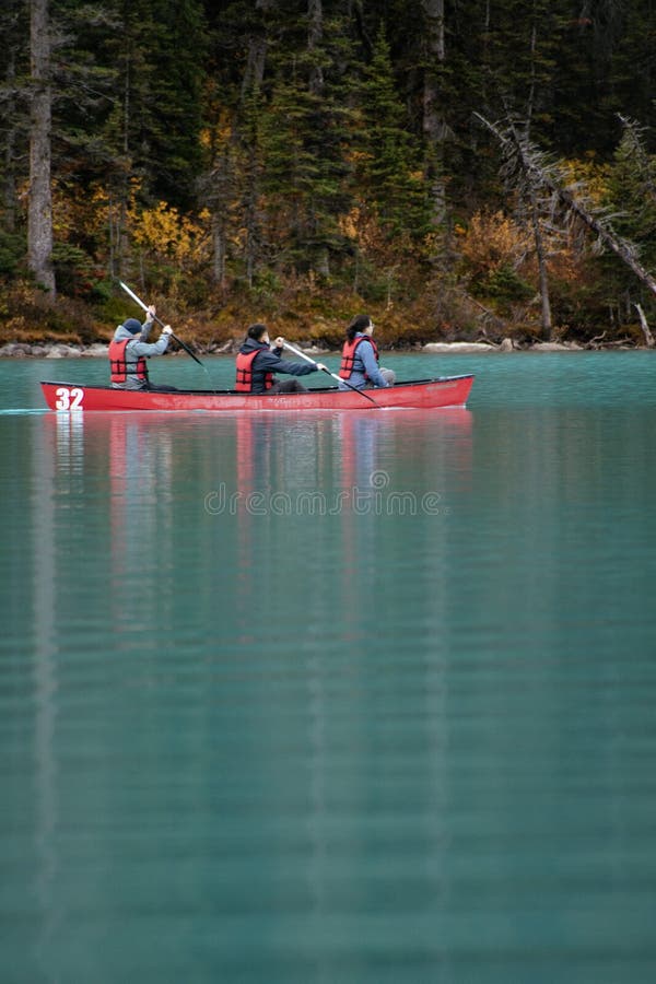 Vertical Shot of the Canoe in the Lake Stock Image - Image of summer ...