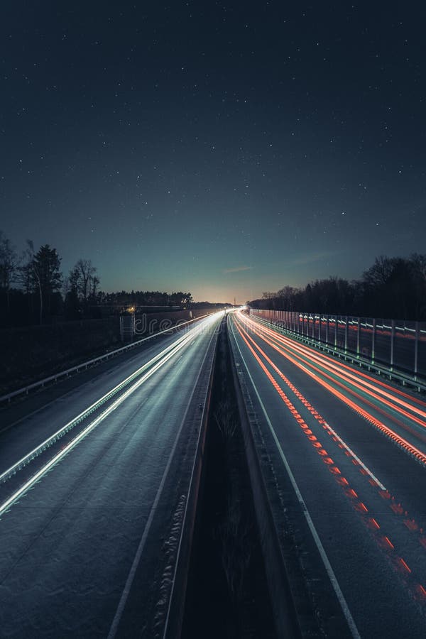 Vertical Shot of Car Lights on Roads with Long Exposure Effect during ...