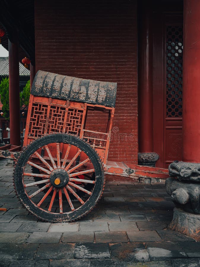 Vertical Shot of a Carriage in Front of a Traditional Building Stock ...