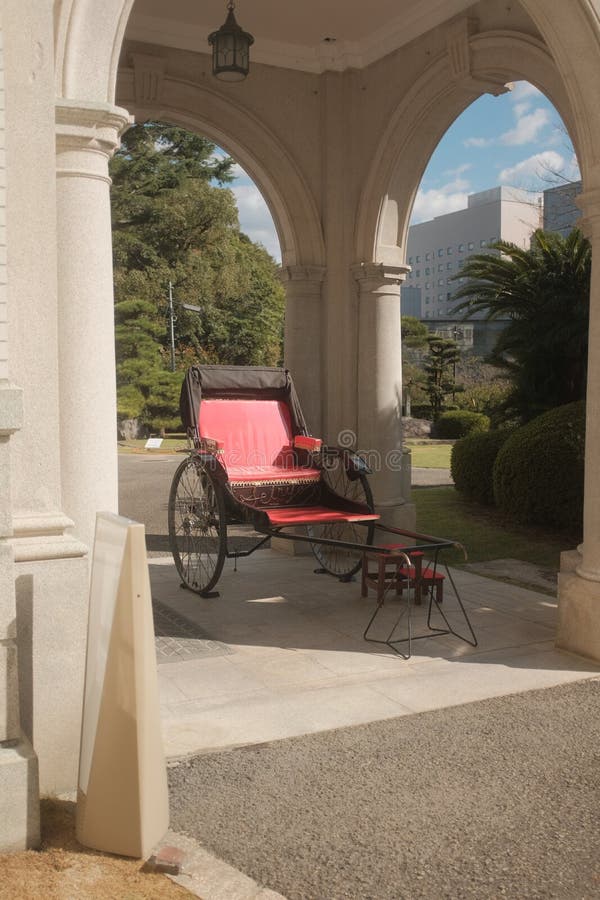Vertical Shot of a Carriage Under Structure with Columns on a Sunny Day ...