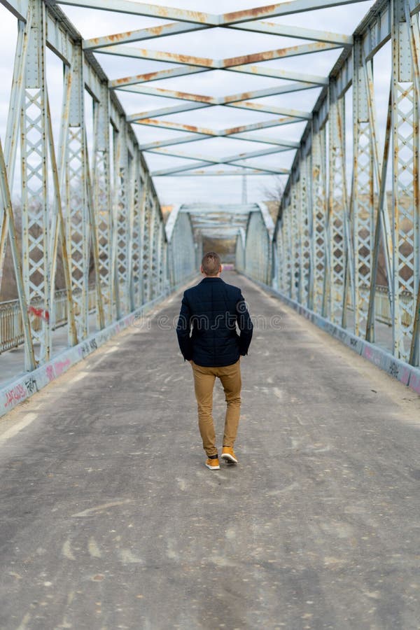 Vertical Shot of a of a Caucasian White Man on the Bridge Stock Image ...