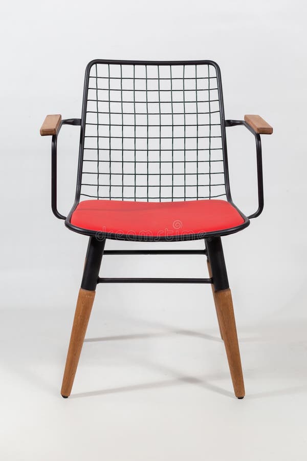 Vertical Shot of a Chair with a Net on a Chair S Back Behind a White ...