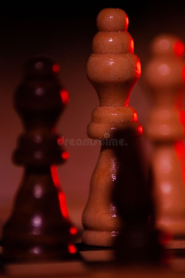 Vertical Shot of Chess Pieces in a Red Light Stock Image - Image of ...