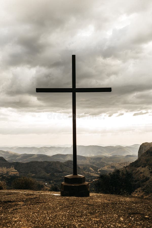 Vertical Shot of a Christian Cross on a Cliff during Overcast Stock ...