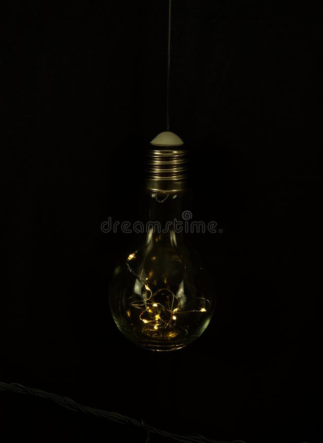 Vertical Shot of Christmas Lights in a Bulb on a Black Isolated ...