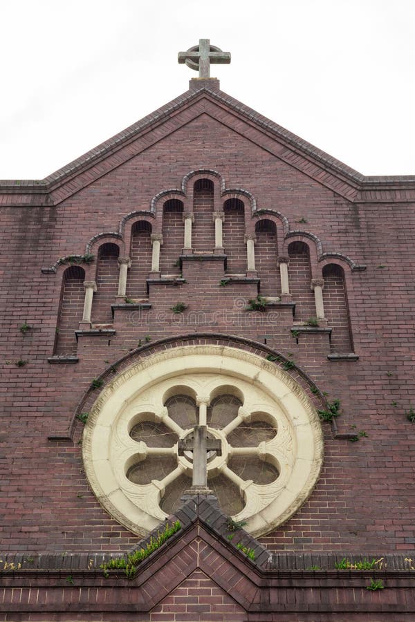 Vertical Shot of a Church Facade Stock Image - Image of european, cross ...