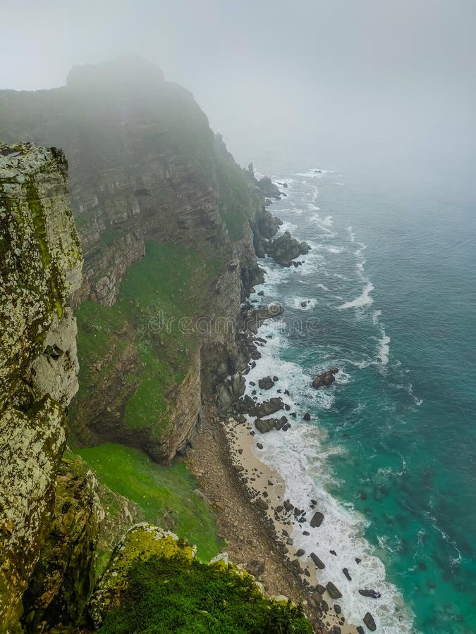 Vertical Shot of Cliff by the Sea Surro Stock Image - Image of ocean ...