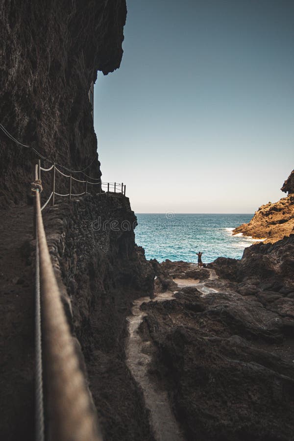 Vertical Shot of Cliffs by the Sea Stock Photo - Image of vacation ...