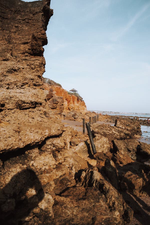 Vertical Shot of Cliffs on the Seaside Stock Photo - Image of ...