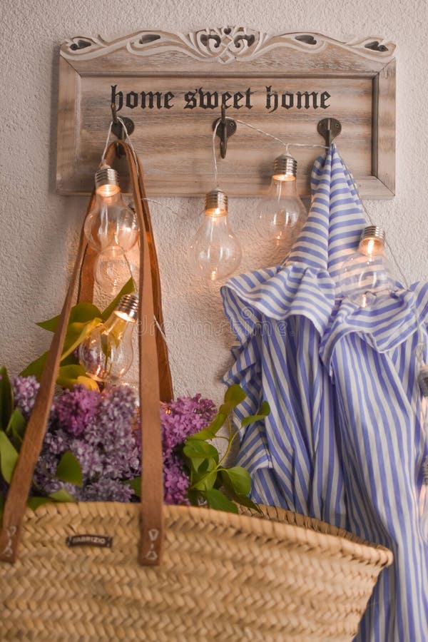 Vertical Shot of a Cloth Hanger with a & X22;home Sweet Home& X22 ...