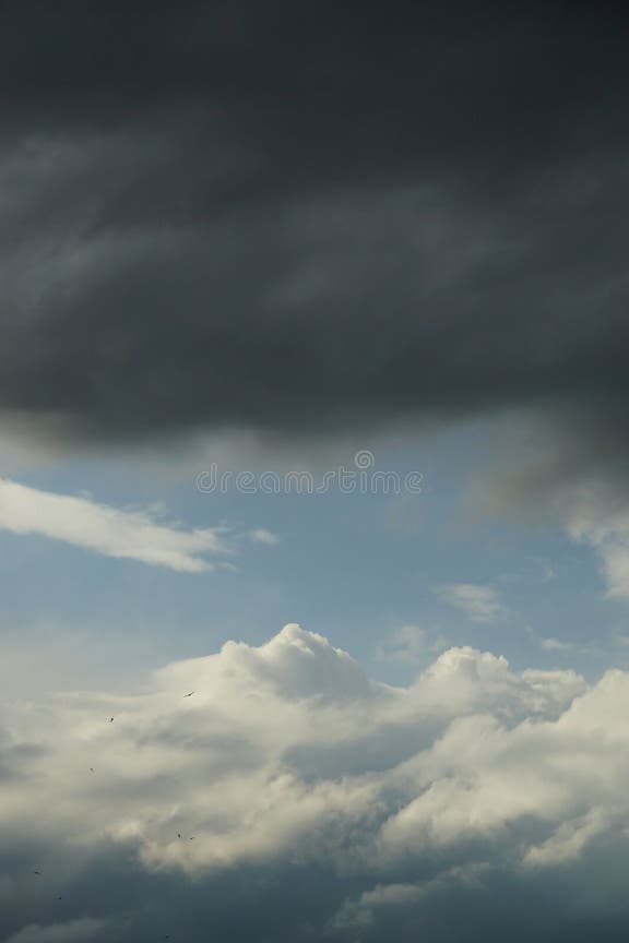 Vertical Shot of Cloudscape with Dark Clouds in the Atmosphere in ...