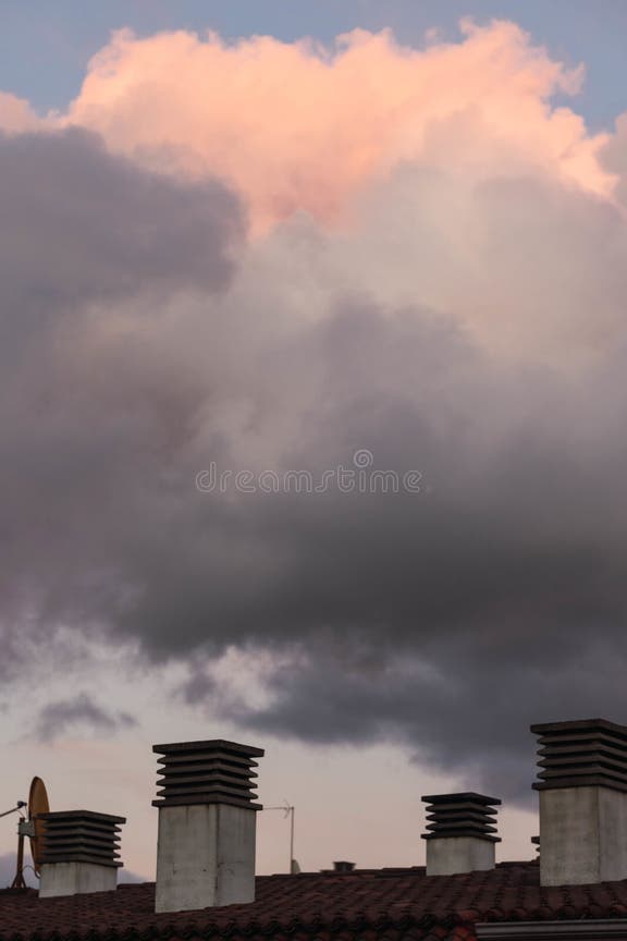 Vertical Shot of the Cloudy Sky Above a Building Stock Image - Image of ...