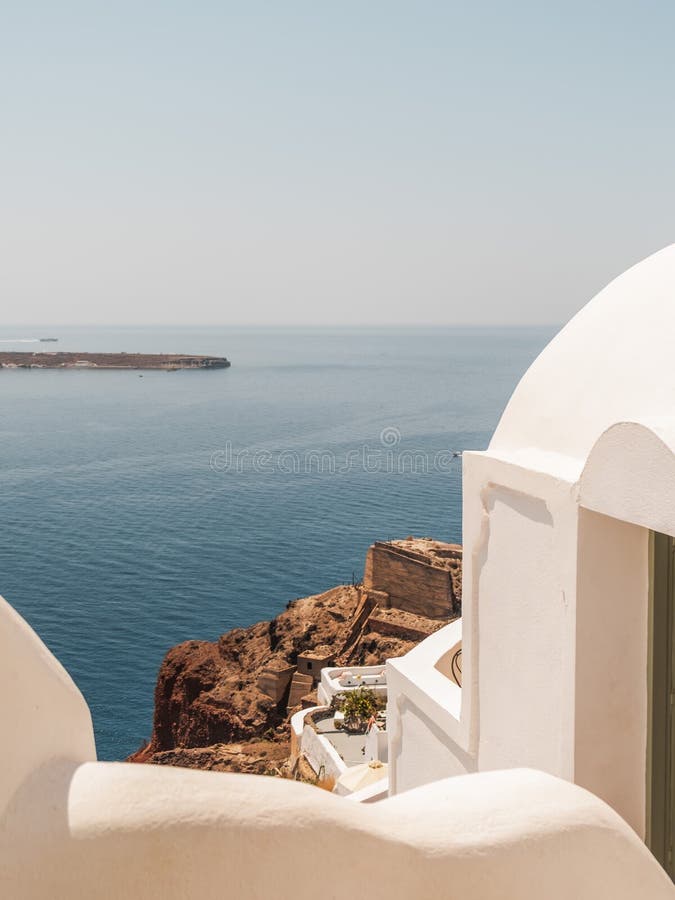 Vertical Shot of the Coastal Buildings of Santorini in Greece Stock ...