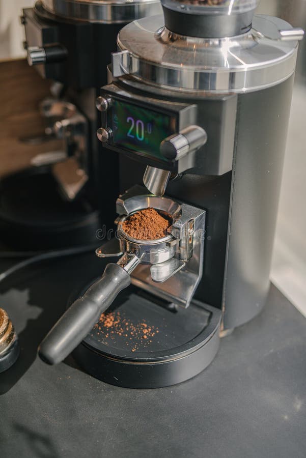 Vertical Shot of a Coffee Shop Espresso Grinder Stock Photo - Image of ...