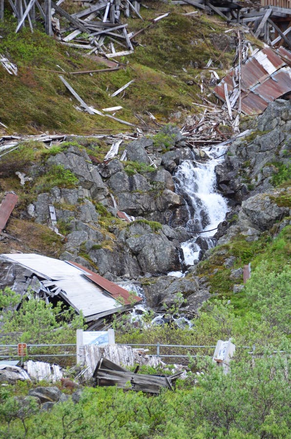 Vertical Shot of Collapsed House Ruins on the Mountain Slope Stock ...