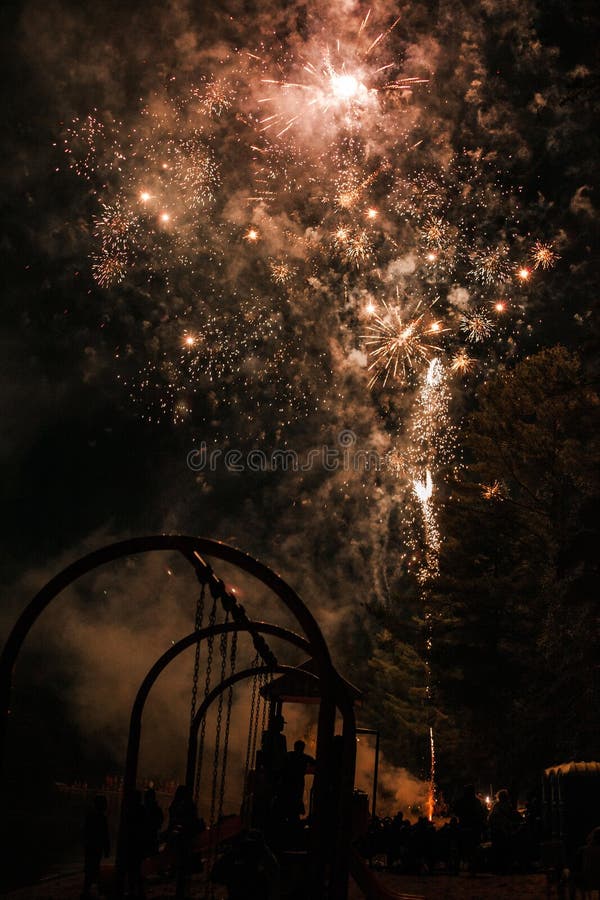 Vertical Shot of the Colorful Fireworks in the Night Sky Stock Photo ...