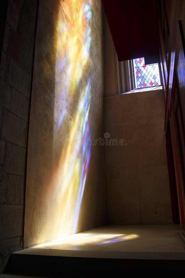 Vertical Shot of a Colorful Shadow from the Stained Glass in a ...