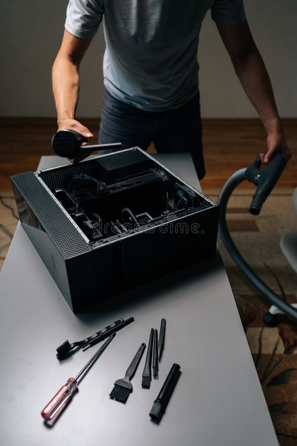 Vertical Shot of Computer Repair Professional Cleaning Computer ...