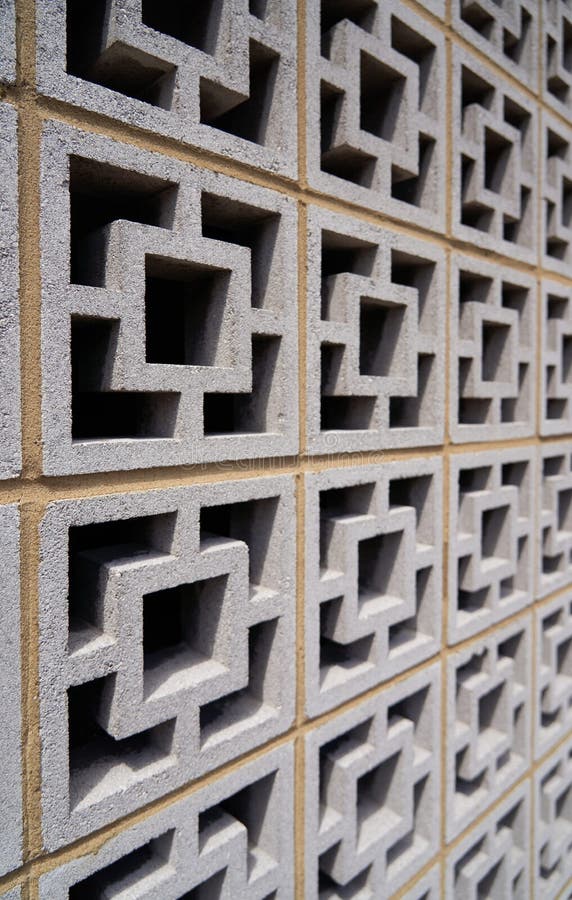 Vertical Shot of Concrete Blocks with a Recessed Pattern Form a Wall in Sunlight Stock ...