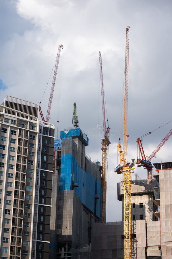 Vertical Shot of a Construction Site in Bangkok Using Tall Cranes ...