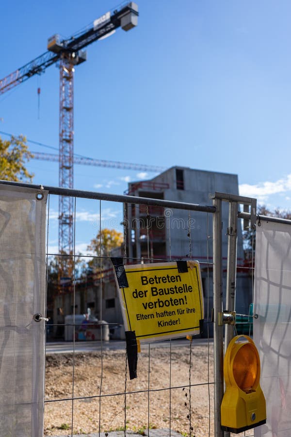 Vertical Shot of the Construction Site through a Construction Fence ...