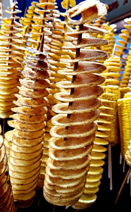 Vertical Shot of Curled Potato Chips on Sticks Stock Image - Image of ...