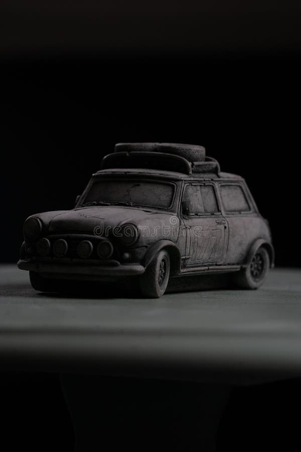 Vertical Shot of a Dark Mini Cooper in a Moody Lighting Stock Image ...