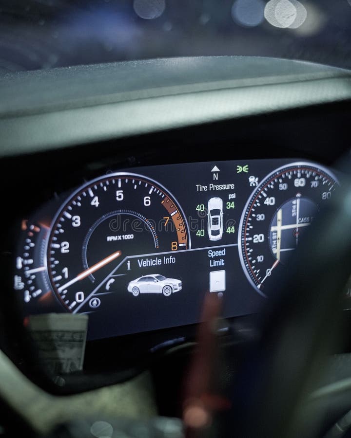Vertical Shot of the Dashboard Cluster of a Car, Showing the Various ...
