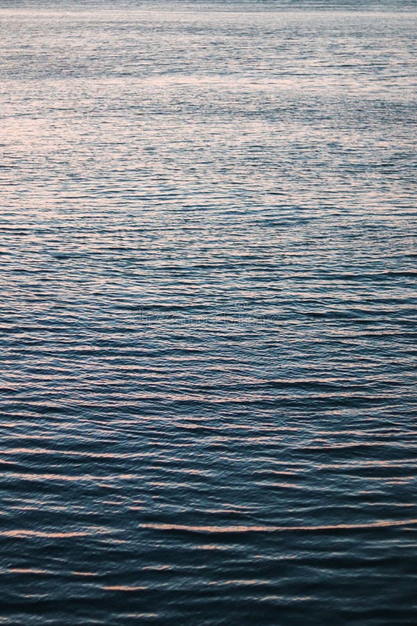 Vertical Shot of a Deep Blue Ocean Calm Water Stock Image - Image of ...