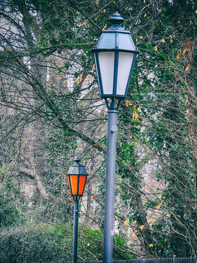 Vertical Shot of Different Looking Lamp Posts Stock Image - Image of ...