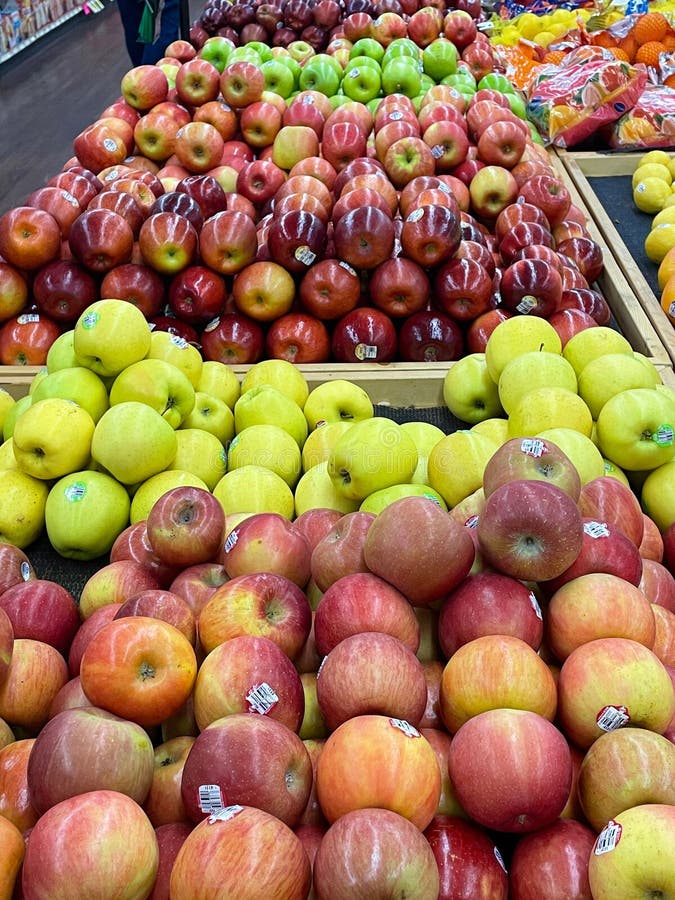 Vertical Shot of Different Varieties of Fresh Apples in Store Editorial ...