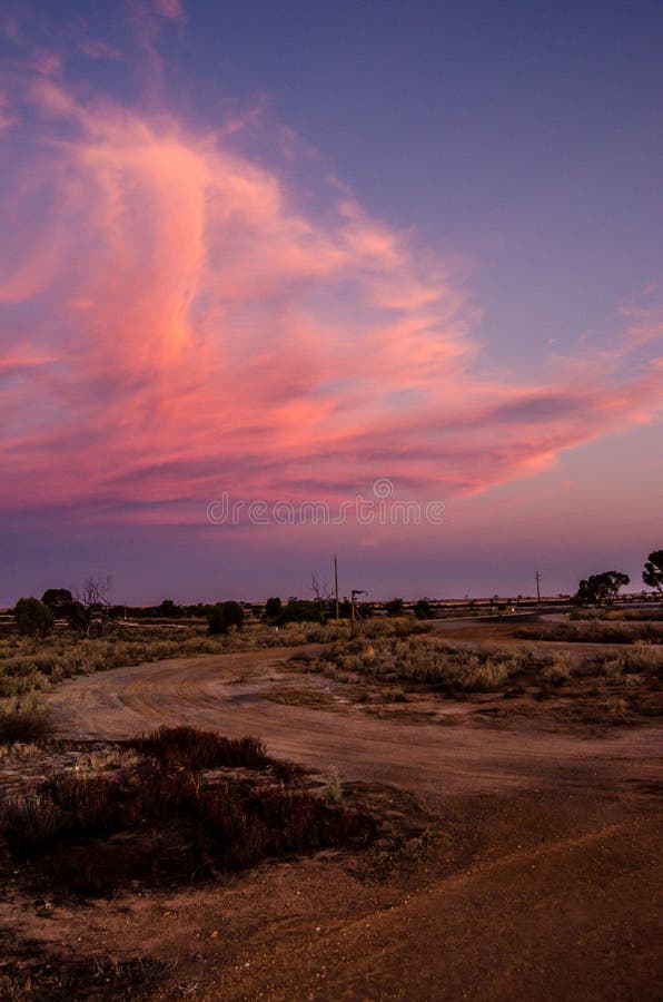Vertical Shot of a Dirty Desolate Narrow Path in Sunset Stock Image ...