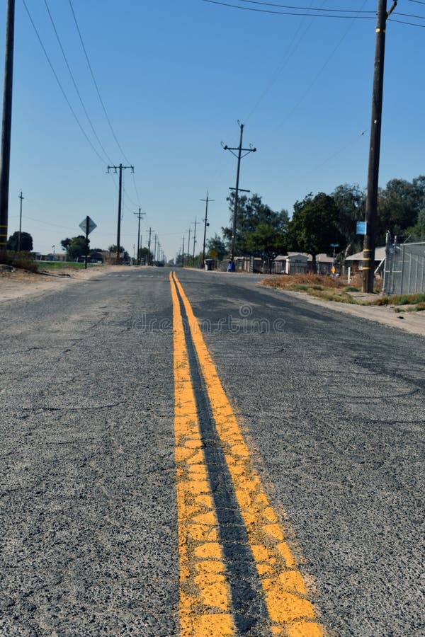 Vertical Shot of an Empty Road during Daytime Stock Photo - Image of ...