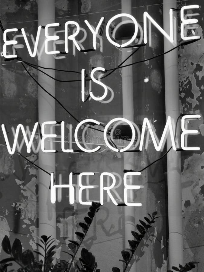 Vertical Shot of Everyone is Welcome Here Sign Stock Image - Image of ...