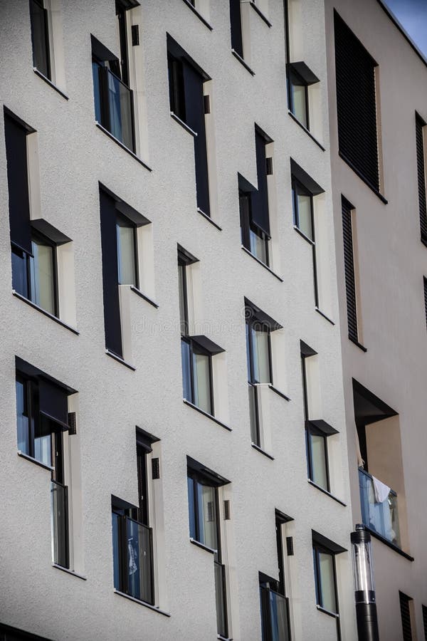 Vertical Shot of a Facade of a Modern Residential Building Stock Photo ...