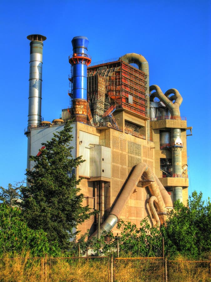 Vertical Shot of a Factory Structure Showcasing a Multitude of Piping ...