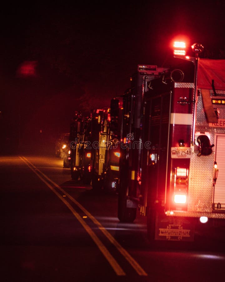 Vertical Shot of Fire Engines at Night Editorial Stock Image - Image of ...