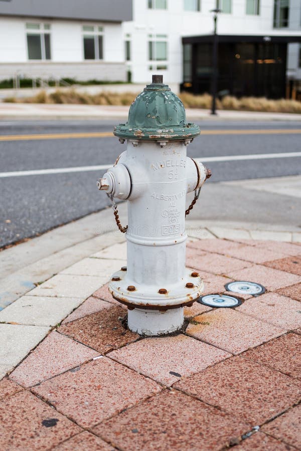 Vertical Shot of a Fire Hydrant Near the Street Stock Image - Image of ...