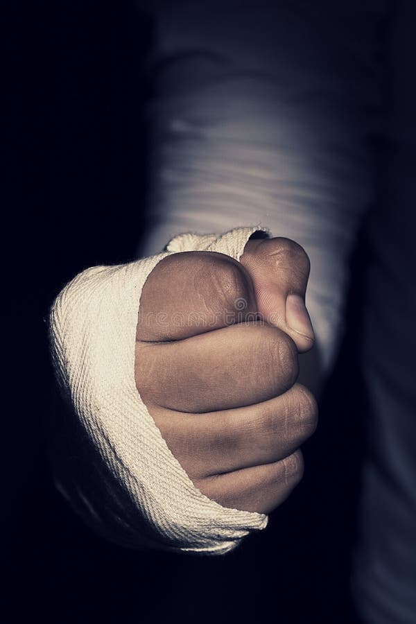 Vertical Shot of a Fist Wrapped with White Bandage Stock Image - Image ...