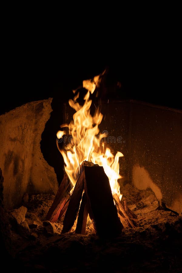 Vertical Shot of a Flaming Campfire in the Dark Stock Image - Image of ...